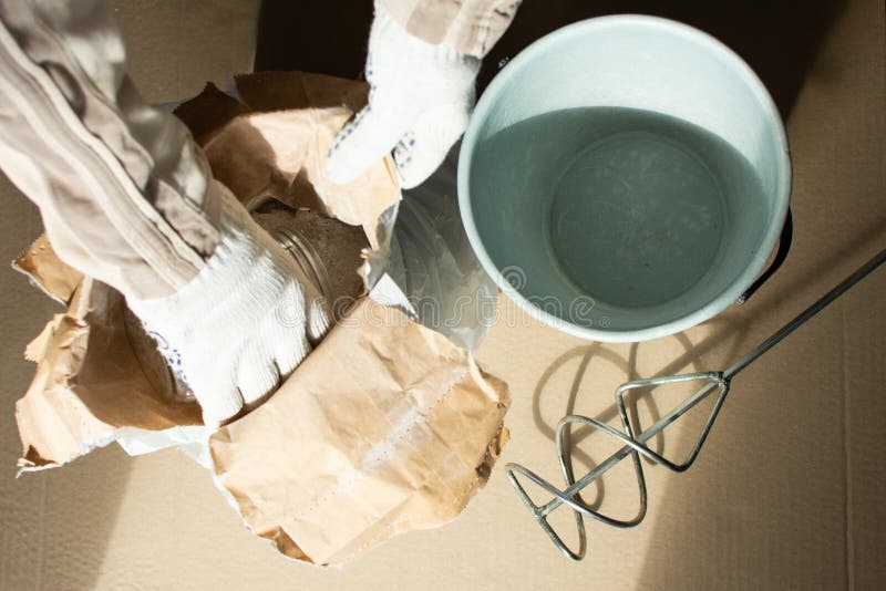 Man Builder Prepares a Mixture for Putty Stock Image - Image of craft ...