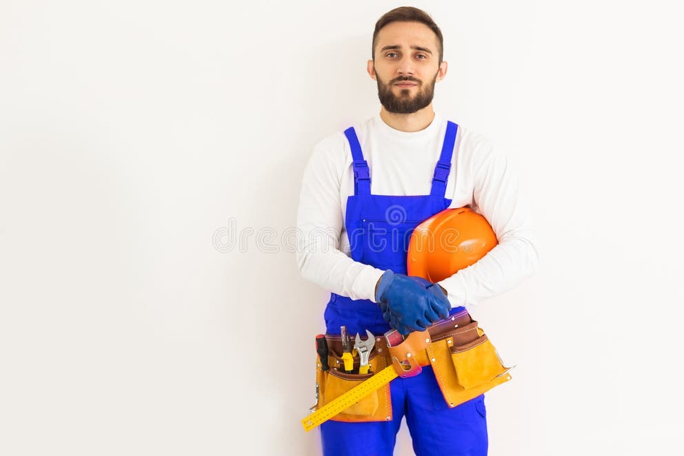 Man Builder in a Robe, Overalls on a White Background. Isolate, Copy ...