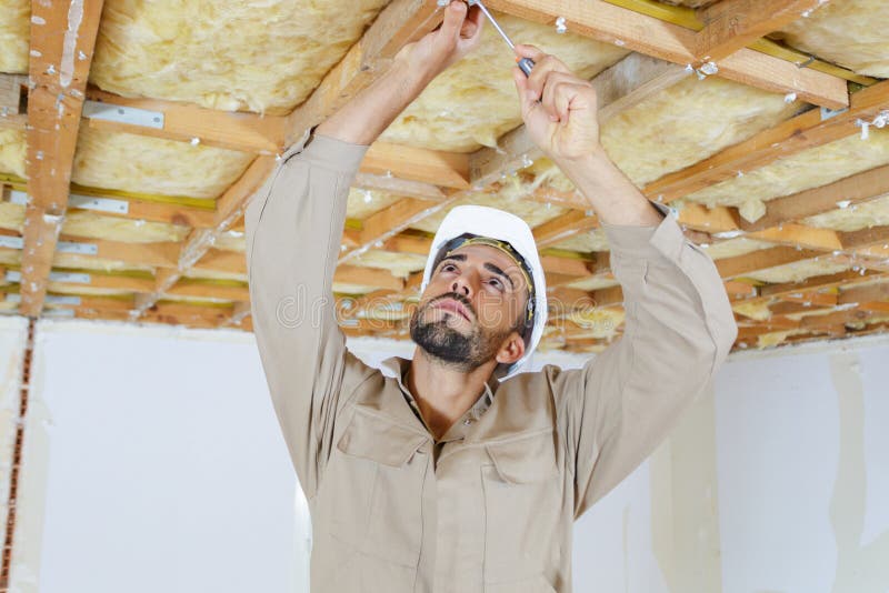Man Builder Working on Ceiling Stock Image - Image of hand, reaching ...