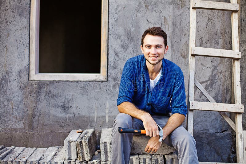Man building his house stock image. Image of ladder, foreman - 61746849