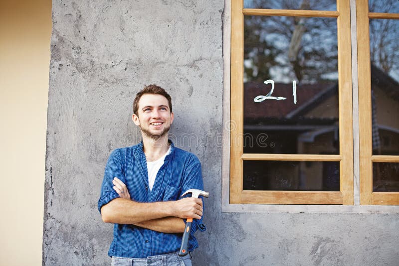 Man building his house stock photo. Image of lifestyles - 61746866