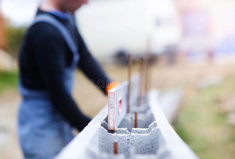 Man building a house stock photo. Image of trowel, skill - 53711416