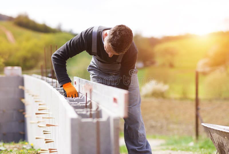 Man building a house stock photo. Image of spring, manual - 55148160