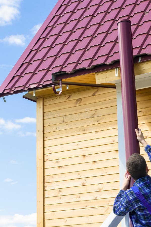 A Man Building a House in a Shirt Stock Photo - Image of hand, people ...