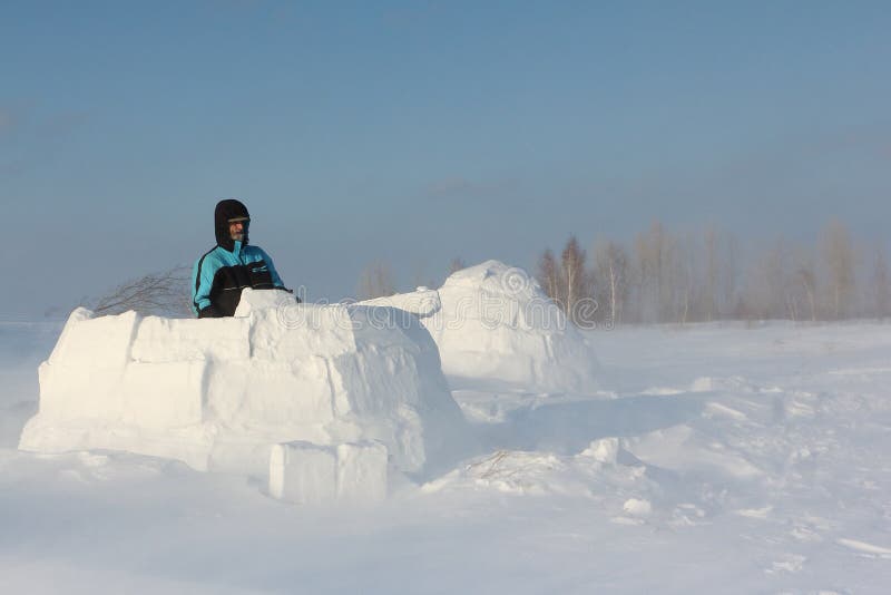 Man Building an Igloo in a Blizzard Stock Image - Image of caucasian ...
