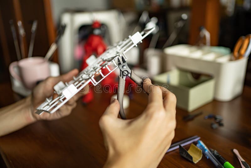 A Man Building a Plastic Model Kit Stock Photo - Image of concentrate ...