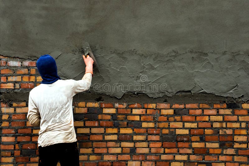 Man building wall stock image. Image of force, cement - 55194049