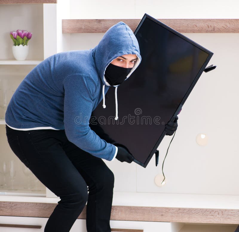 Man Burglar Stealing Tv Set from House Stock Photo - Image of disguise ...
