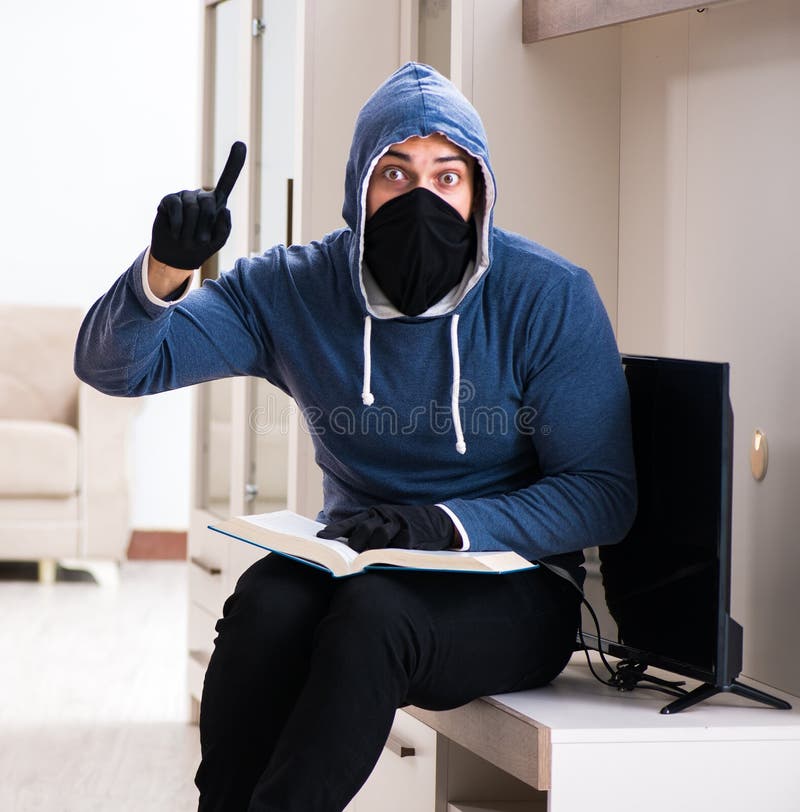 Man Burglar Stealing Tv Set from House Stock Image - Image of apartment ...