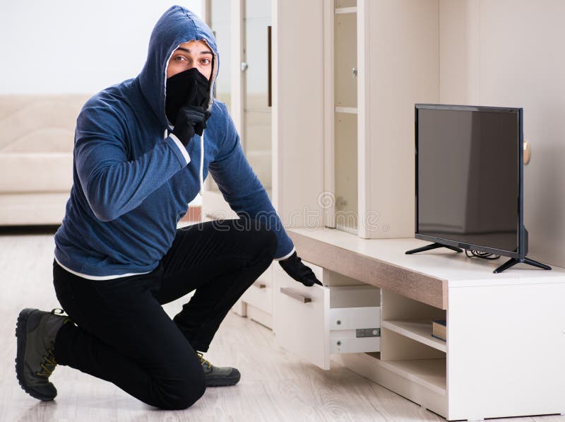 Man Burglar Stealing Tv Set from House Stock Image - Image of drawer ...