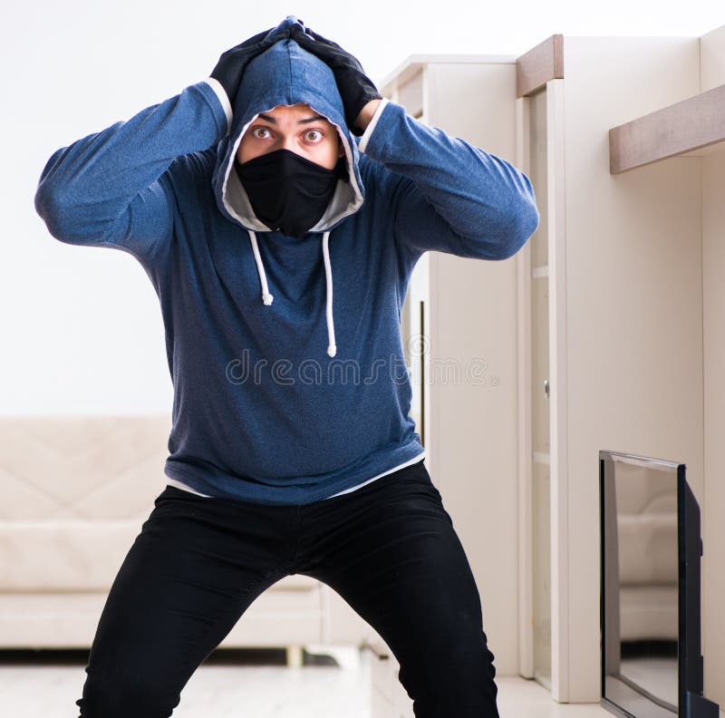 Man Burglar Stealing Tv Set from House Stock Photo - Image of breaking ...