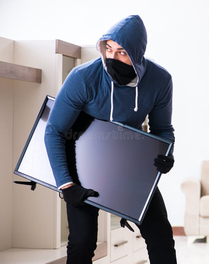 Man Burglar Stealing Tv Set from House Stock Photo - Image of burglar ...