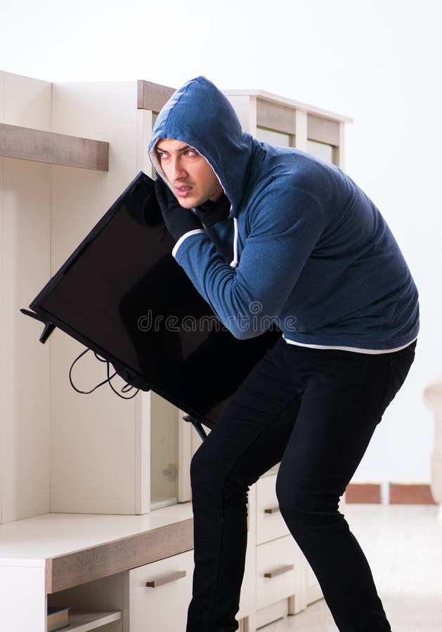 Man Burglar Stealing Tv Set from House Stock Image - Image of property ...