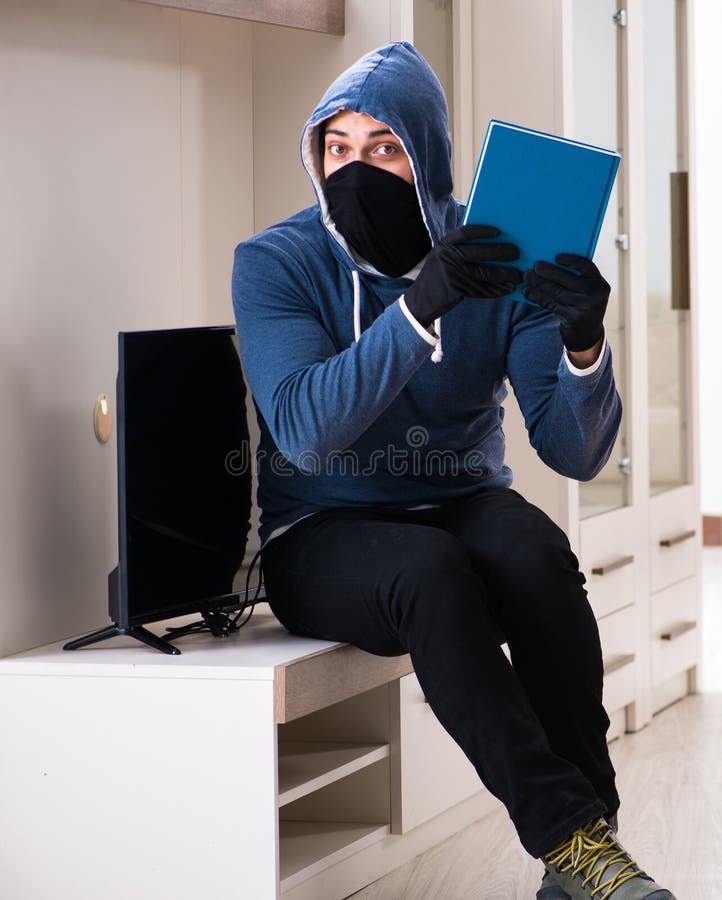 Man Burglar Stealing Tv Set from House Stock Image - Image of looting ...