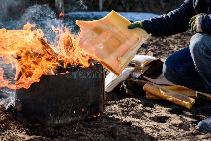 A Man Burning Old Unwanted Things from Home in a Bonfire in Early ...