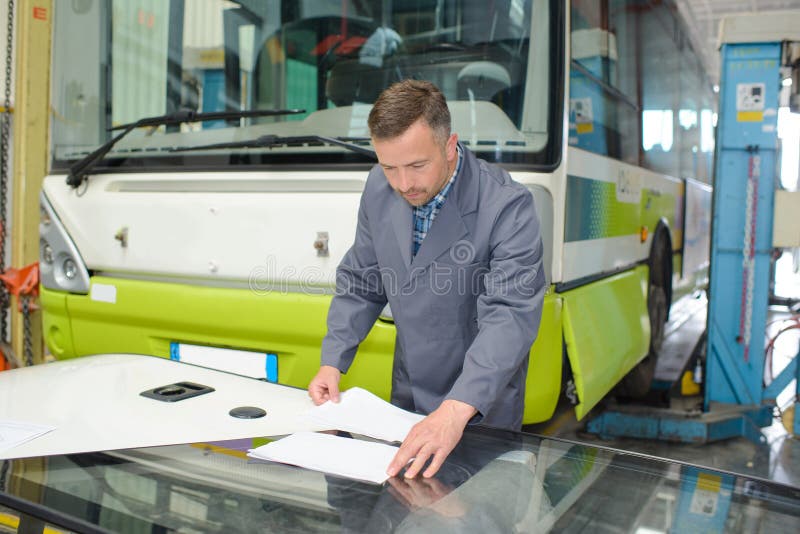 Man in bus depot stock image. Image of safety, routine - 301294977