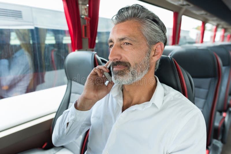 Man on Bus Talking To Phone Stock Image - Image of smartphone, loud ...