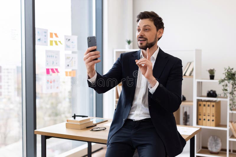 Businessman Conducting Video Call Modern Workspace Wearing Formal Suit ...