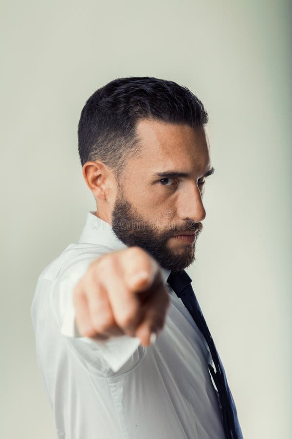 Man in Business Attire Shows Direction, Exuding Confidence and C Stock ...