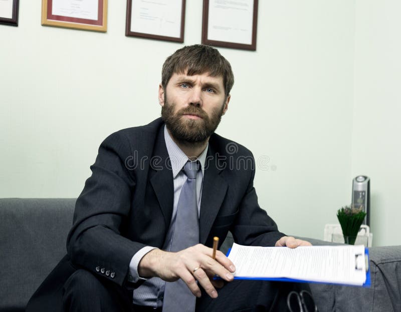 Man in a Business Suit Holding a Job Interview. Ready for Interview ...