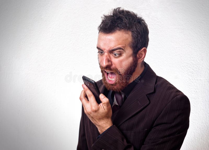 Man in Business Suit Shouting into His Mobile Phone Stock Photo - Image ...