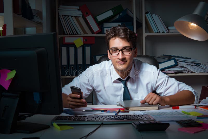 The Man Businessman Working Late Hours in the Office Stock Photo ...