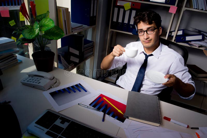 The Man Businessman Working Late Hours in the Office Stock Photo ...