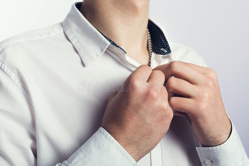 Young Man Buttoning a Button Stock Photo - Image of groom, important ...