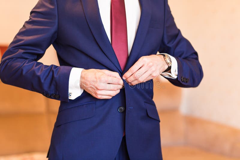 Man Buttoning Jacket Close-up Stock Photo - Image of retail ...