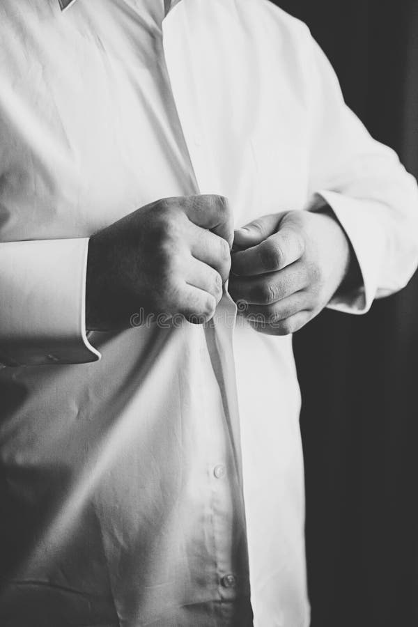 Man Buttons Up a White Shirt Stock Photo - Image of amazing, lifestyle ...