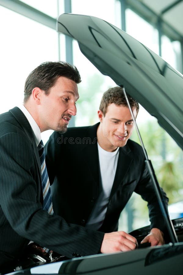 Man Buying Car from Salesperson Stock Photo - Image of adult ...