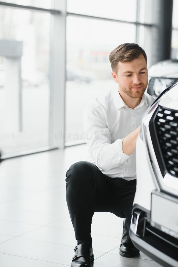 Man Buying a Car at a Showroom Stock Photo - Image of caucasian, adult ...