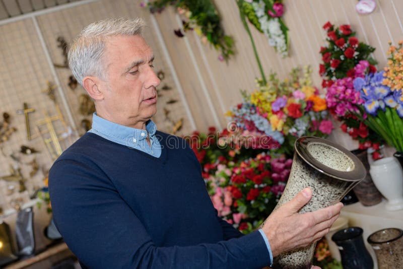 Man buying in funeral shop stock image. Image of store - 304132679