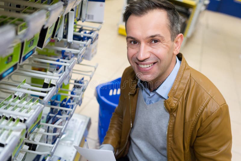 Man buys something at shop stock image. Image of centre - 196685225