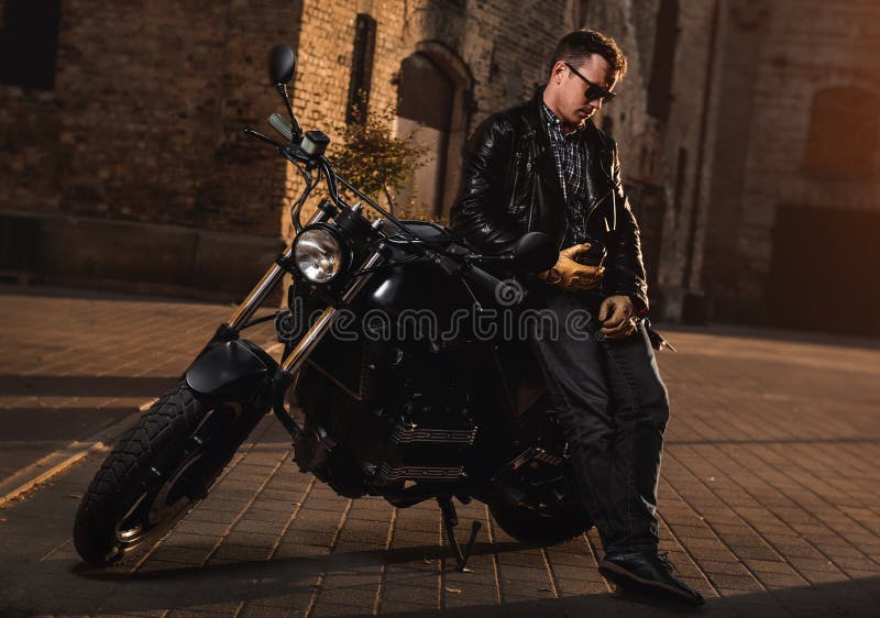 Motorcyclist with a Cafe-racer Motorcycle Stock Photo - Image of ...