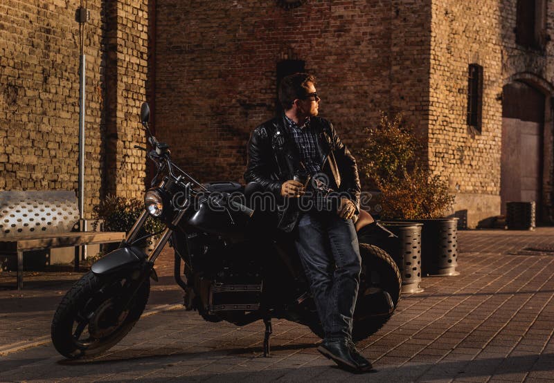 Motorcyclist with a Cafe-racer Motorcycle Stock Photo - Image of ...