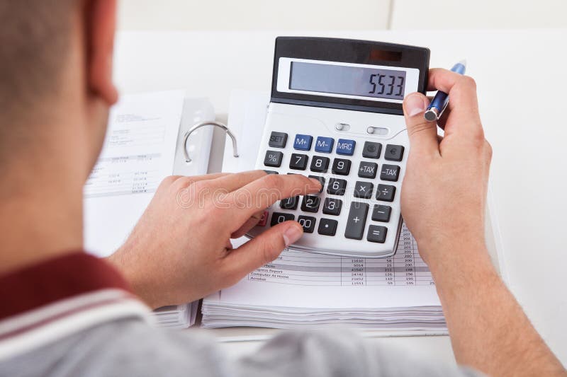 Man Calculating Financial Expenses Stock Photo - Image of paperwork ...