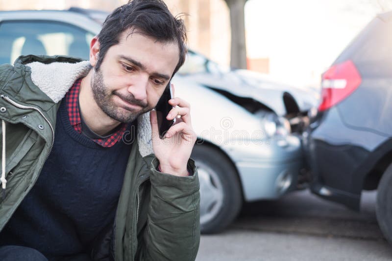 Men Calling First Aid after a Bad Car Crash on the Road Stock Image ...