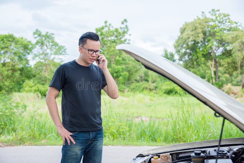 Man Calling Mobile Phone for Assistance on the Road Stock Photo - Image ...