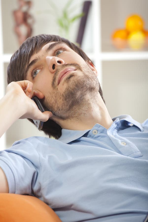 Man calling on phone stock image. Image of resting, holding - 17247571