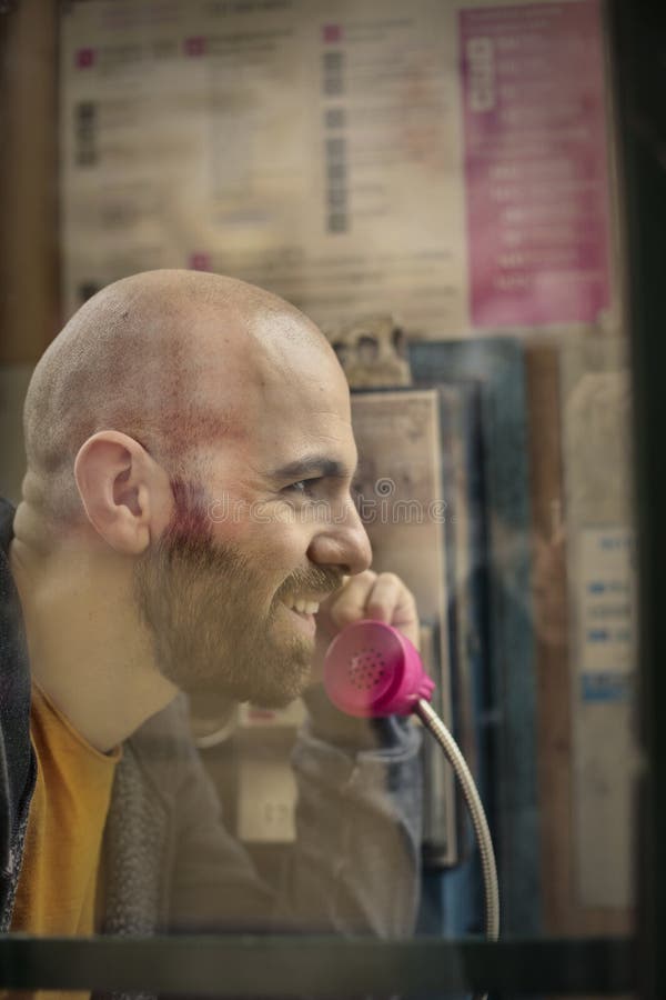 Man Calling from a Telephone Booth Stock Photo - Image of happy ...