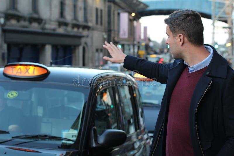 Man Calling a Traditional British Cab Stock Image - Image of city ...