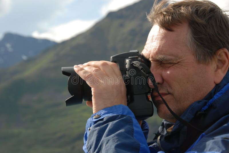 Man with Camera stock photo. Image of years, camera, vacation - 13981926