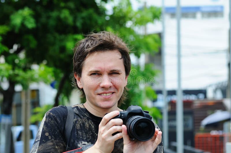 Man with camera. stock photo. Image of photographic, person - 26371716