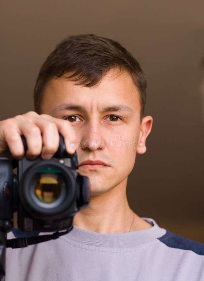 Man with camera stock photo. Image of 35mm, clothing, head - 9126678
