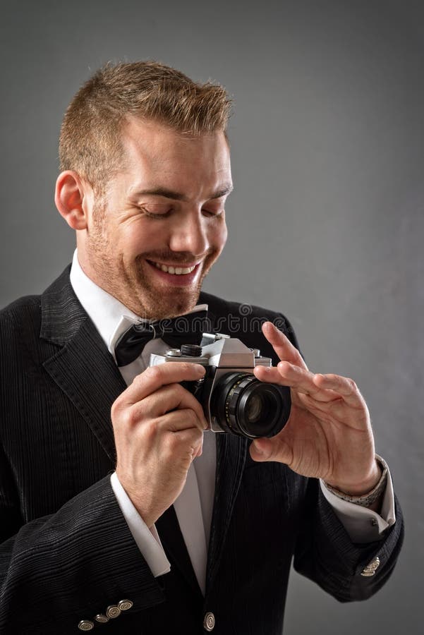 Man with camera stock photo. Image of hands, confident - 38890522