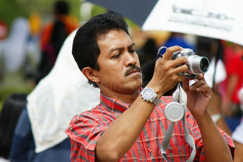 Man with camera editorial image. Image of lifestyle - 112132470