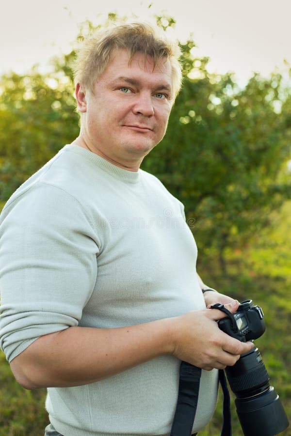 Man with a camera stock image. Image of white, male, young - 34594263