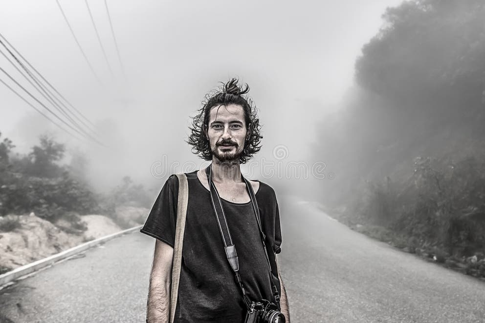 Man with Camera Standing in a Fog Stock Photo - Image of travel ...