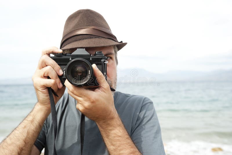 Man with camera stock image. Image of handsome, equipment - 35331347